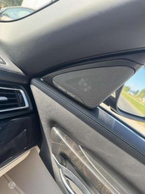 Blue BMW 750 2015 in Kaunas, with an engine capacity of 2.99 L and mileage of 126 thousand km for 15650 €, photo 22 on AUTOMOTO.COM.LV