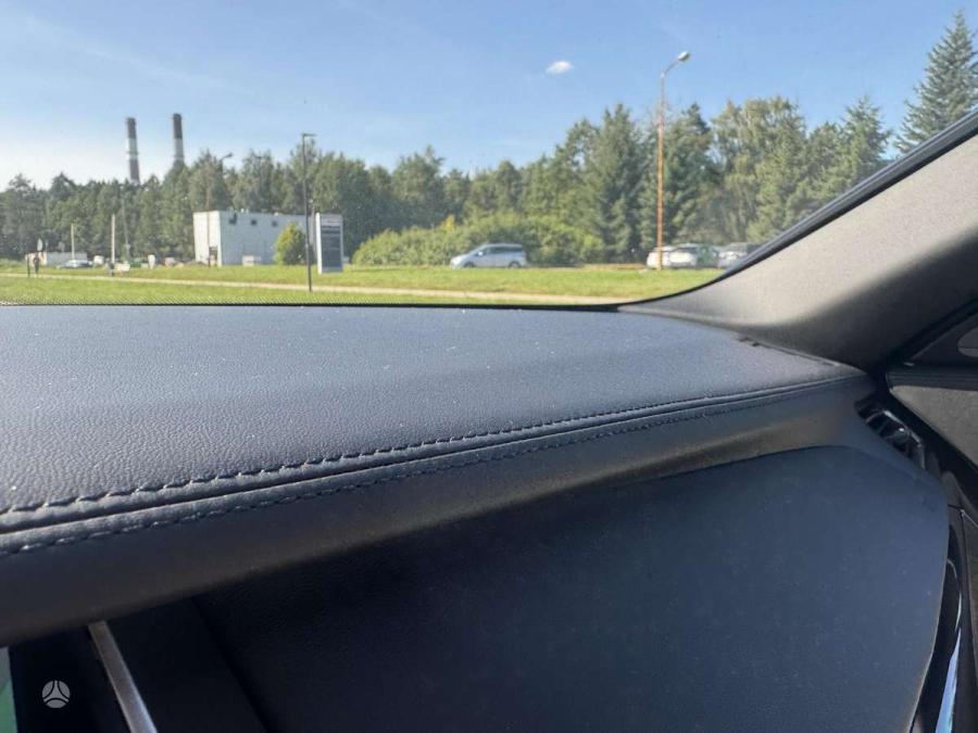 Blue BMW 750 2015 in Kaunas, with an engine capacity of 2.99 L and mileage of 126 thousand km for 15650 €, photo 23 on AUTOMOTO.COM.LV