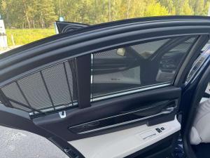 Blue BMW 750 2015 in Kaunas, with an engine capacity of 2.99 L and mileage of 126 thousand km for 15650 €, photo 31 on AUTOMOTO.COM.LV