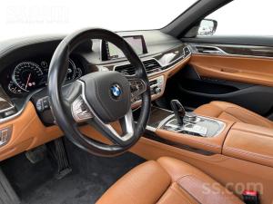 Синий БМВ 750 2018 в Рига, объемом двигателя 3.00 л и пробегом 185 тыс. км за 29990 €, фото 12 на AUTOMOTO.COM.LV