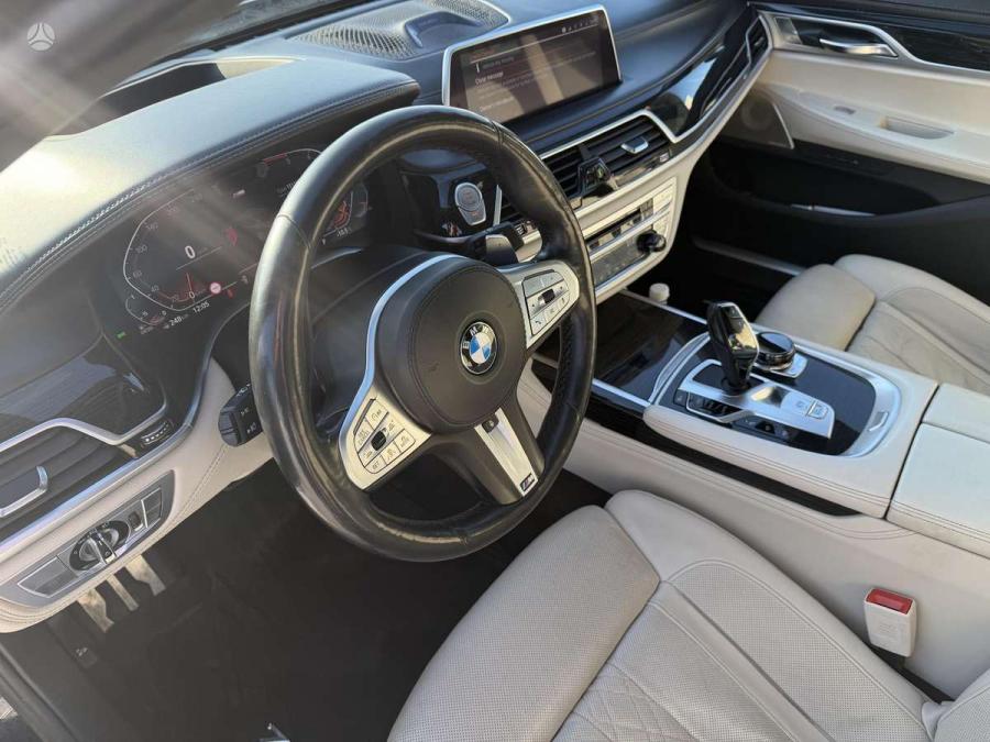 Blue BMW 750 2020 in Kaunas, with an engine capacity of 2.99 L and mileage of 151 thousand km for 44999 €, photo 11 on AUTOMOTO.COM.LV