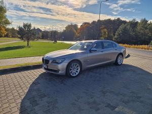 Brown BMW 750 2013 in Vilnius, with an engine capacity of 4.40 L and mileage of 148 thousand km for 9400 €, photo  on AUTOMOTO.COM.LV