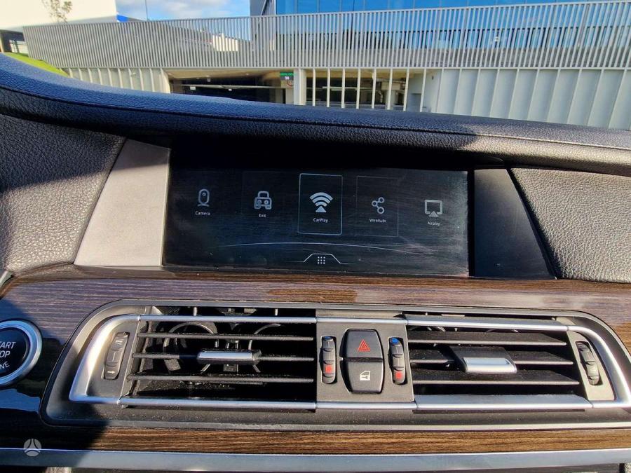 Brown BMW 750 2013 in Vilnius, with an engine capacity of 4.40 L and mileage of 148 thousand km for 9400 €, photo 8 on AUTOMOTO.COM.LV