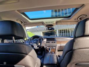 Brown BMW 750 2013 in Vilnius, with an engine capacity of 4.40 L and mileage of 148 thousand km for 9400 €, photo 12 on AUTOMOTO.COM.LV