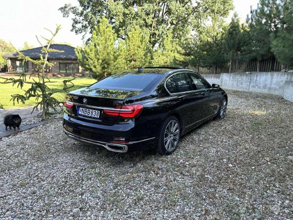 Brown BMW 750 2017 in Marijampole, with an engine capacity of 2.99 L and mileage of 123 thousand km for 33500 €, photo 4 on AUTOMOTO.COM.LV