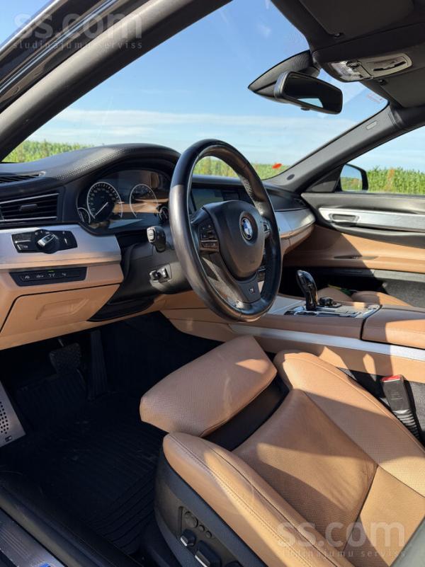 Grey BMW 750 2011 in Jelgava, with an engine capacity of 4.40 L and mileage of 216 thousand km for 12900 €, photo 7 on AUTOMOTO.COM.LV