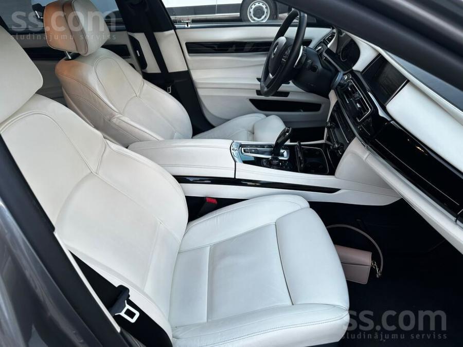 Grey BMW 750 2012 in Riga, with an engine capacity of 3.00 L and mileage of 214 thousand km for 17850 €, photo 9 on AUTOMOTO.COM.LV