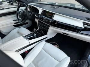 Grey BMW 750 2012 in Riga, with an engine capacity of 3.00 L and mileage of 214 thousand km for 17850 €, photo 10 on AUTOMOTO.COM.LV
