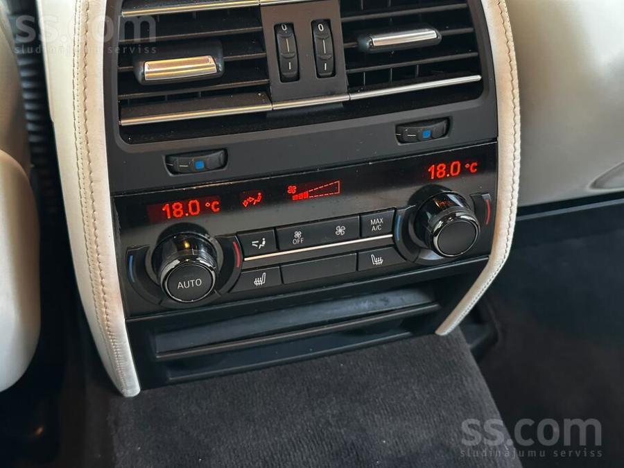 Grey BMW 750 2012 in Riga, with an engine capacity of 3.00 L and mileage of 214 thousand km for 17850 €, photo 20 on AUTOMOTO.COM.LV