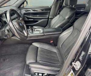 BMW 750 2016 in Vilnius, with an engine capacity of 4.40 L and mileage of 150 thousand km for 18800 €, photo 12 on AUTOMOTO.COM.LV