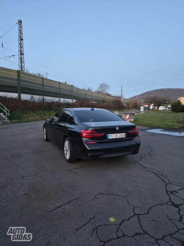 BMW 750 2017 in Vilnius, with an engine capacity of 4.40 L and mileage of 96 thousand km for 24500 €, photo 6 on AUTOMOTO.COM.LV