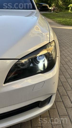 White BMW 750 2009 in Riga, with an engine capacity of 4.40 L and mileage of 214 thousand km for 11500 €, photo 8 on AUTOMOTO.COM.LV