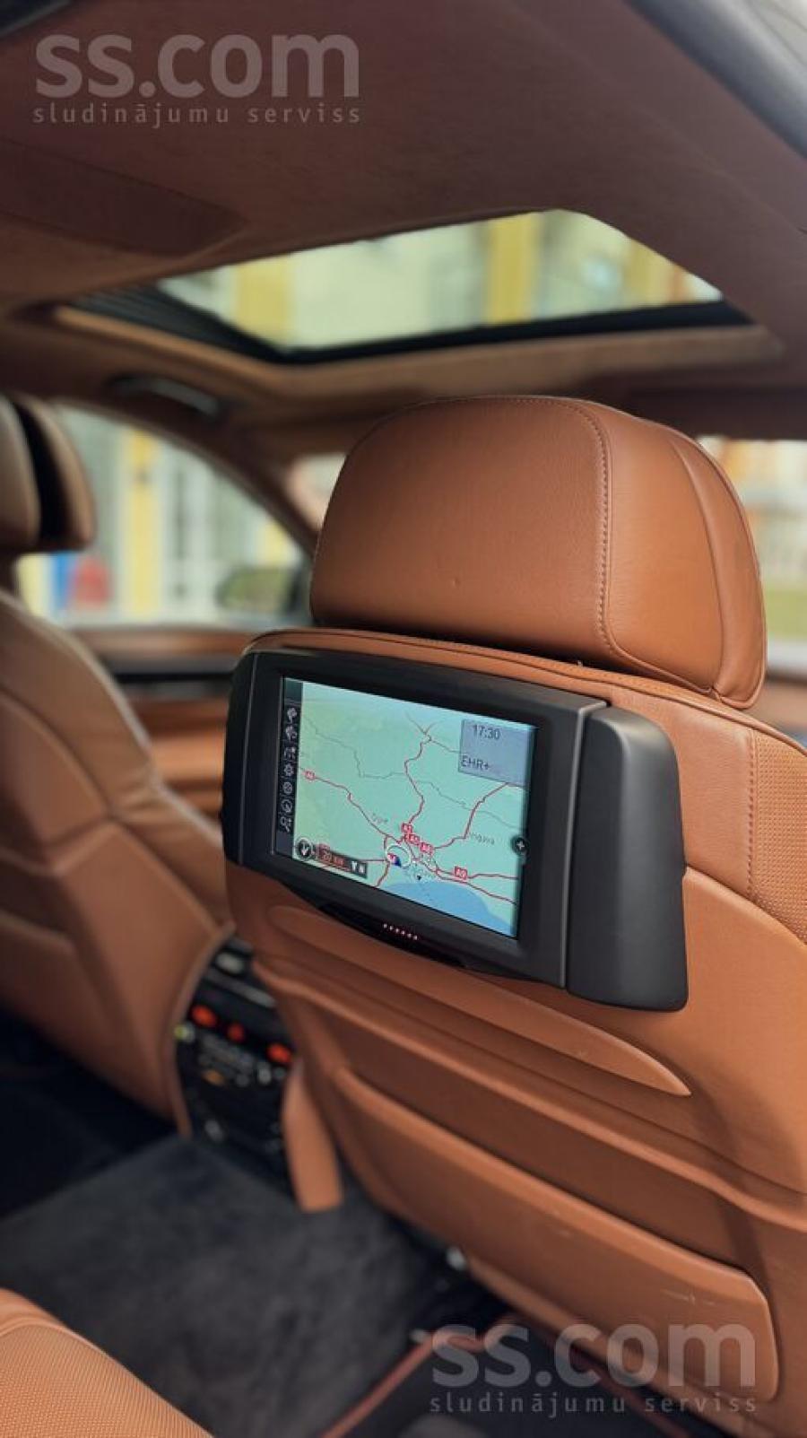 White BMW 750 2009 in Riga, with an engine capacity of 4.40 L and mileage of 214 thousand km for 11500 €, photo 11 on AUTOMOTO.COM.LV