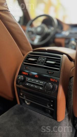 White BMW 750 2009 in Riga, with an engine capacity of 4.40 L and mileage of 214 thousand km for 11500 €, photo 13 on AUTOMOTO.COM.LV