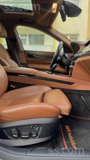 White BMW 750 2009 in Riga, with an engine capacity of 4.40 L and mileage of 214 thousand km for 11500 €, photo 15 on AUTOMOTO.COM.LV