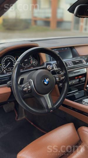 White BMW 750 2009 in Riga, with an engine capacity of 4.40 L and mileage of 214 thousand km for 11500 €, photo 17 on AUTOMOTO.COM.LV
