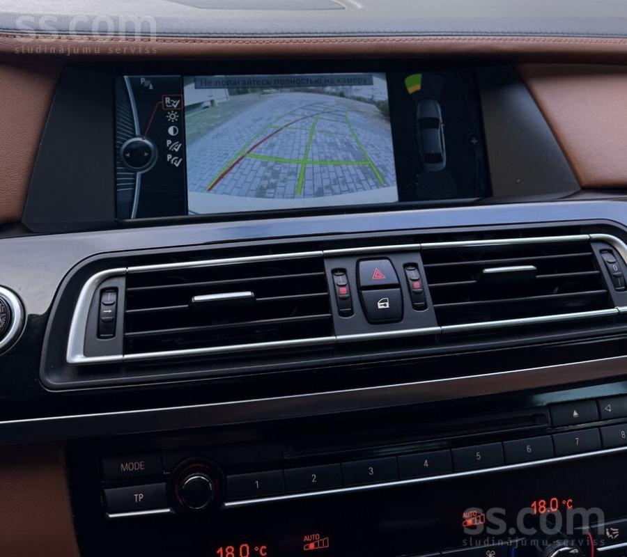 White BMW 750 2009 in Riga, with an engine capacity of 4.40 L and mileage of 214 thousand km for 11500 €, photo 23 on AUTOMOTO.COM.LV