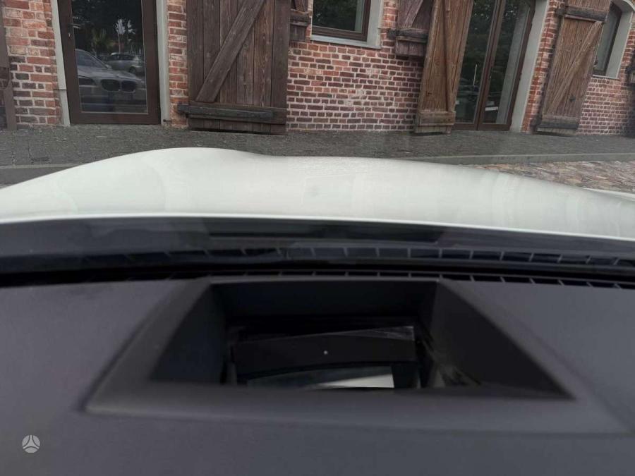 White BMW 750 2010 in Klaipeda, with an engine capacity of 4.40 L and mileage of 171 thousand km for 8700 €, photo 23 on AUTOMOTO.COM.LV