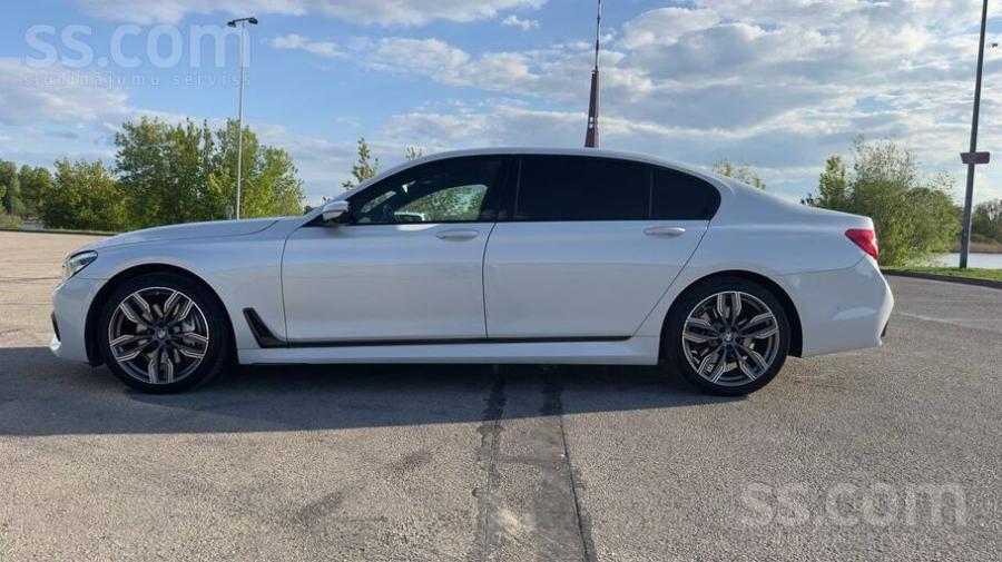 White BMW 750 2016 in Riga, with an engine capacity of 4.40 L and mileage of 96 thousand km for 24990 €, photo 5 on AUTOMOTO.COM.LV