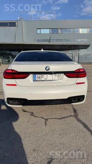 White BMW 750 2016 in Riga, with an engine capacity of 4.40 L and mileage of 96 thousand km for 24990 €, photo 7 on AUTOMOTO.COM.LV