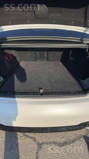 White BMW 750 2016 in Riga, with an engine capacity of 4.40 L and mileage of 96 thousand km for 24990 €, photo 23 on AUTOMOTO.COM.LV
