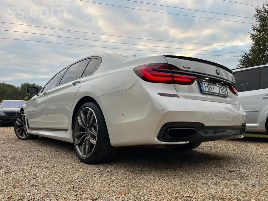 White BMW 750 2016 in Riga, with an engine capacity of 4.40 L and mileage of 173 thousand km for 31750 €, photo 1 on AUTOMOTO.COM.LV