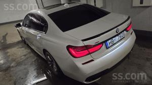 White BMW 750 2016 in Riga, with an engine capacity of 4.40 L and mileage of 173 thousand km for 31750 €, photo 5 on AUTOMOTO.COM.LV