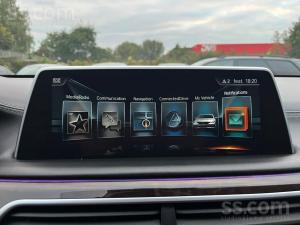 White BMW 750 2016 in Riga, with an engine capacity of 4.40 L and mileage of 173 thousand km for 31750 €, photo 8 on AUTOMOTO.COM.LV