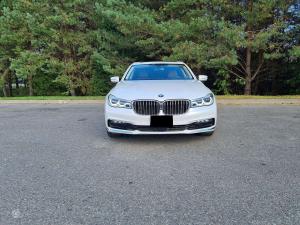 White BMW 750 2016 in Vilnius, with an engine capacity of 4.40 L and mileage of 137 thousand km for 20900 €, photo  on AUTOMOTO.COM.LV