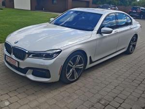 White BMW 750 2016 in Kaunas, with an engine capacity of 4.40 L and mileage of 154 thousand km for 16500 €, photo 4 on AUTOMOTO.COM.LV