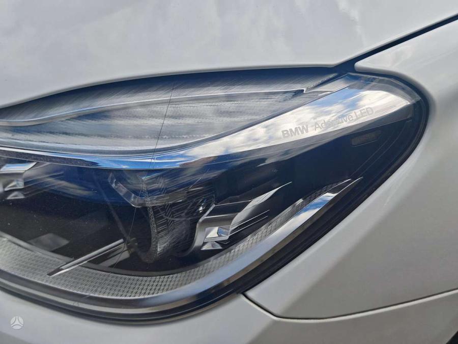 White BMW 750 2016 in Kaunas, with an engine capacity of 4.40 L and mileage of 154 thousand km for 16500 €, photo 10 on AUTOMOTO.COM.LV