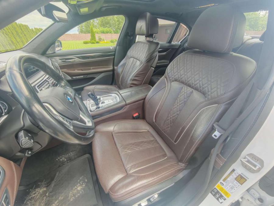 White BMW 750 2016 in Kaunas, with an engine capacity of 4.40 L and mileage of 154 thousand km for 16500 €, photo 17 on AUTOMOTO.COM.LV