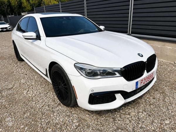 White BMW 750 2016 in Vilnius, with an engine capacity of 4.40 L and mileage of 148 thousand km for 15999 €, photo 1 on AUTOMOTO.COM.LV