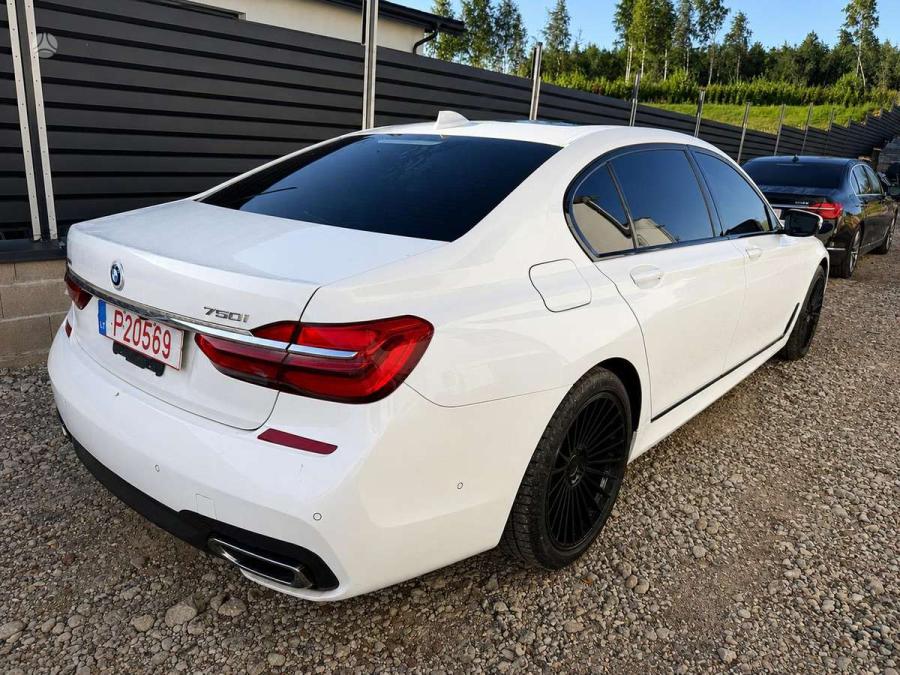 White BMW 750 2016 in Vilnius, with an engine capacity of 4.40 L and mileage of 148 thousand km for 15999 €, photo 5 on AUTOMOTO.COM.LV