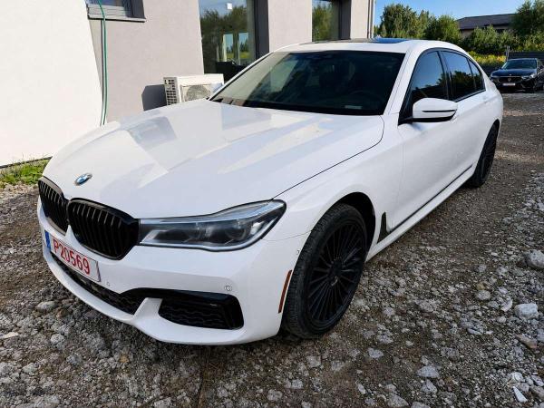 White BMW 750 2016 in Vilnius, with an engine capacity of 4.40 L and mileage of 148 thousand km for 15999 €, photo 7 on AUTOMOTO.COM.LV