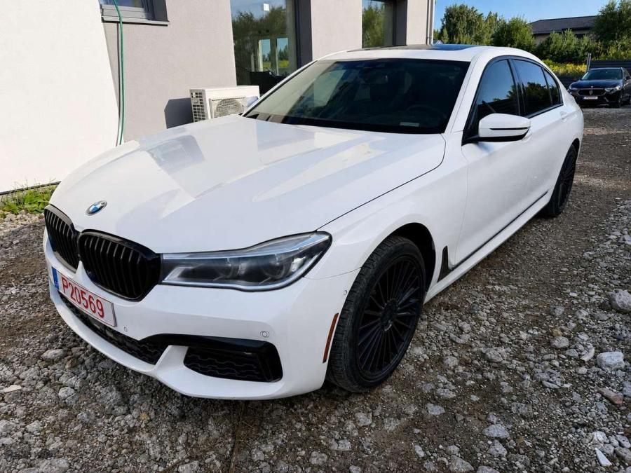 White BMW 750 2016 in Vilnius, with an engine capacity of 4.40 L and mileage of 148 thousand km for 15999 €, photo 8 on AUTOMOTO.COM.LV