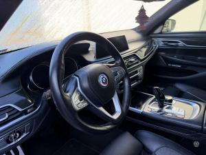 White BMW 750 2016 in Vilnius, with an engine capacity of 4.40 L and mileage of 148 thousand km for 15999 €, photo 10 on AUTOMOTO.COM.LV