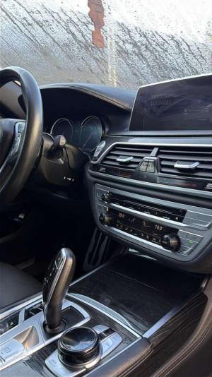 White BMW 750 2016 in Vilnius, with an engine capacity of 4.40 L and mileage of 148 thousand km for 15999 €, photo 11 on AUTOMOTO.COM.LV
