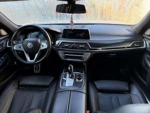 White BMW 750 2016 in Vilnius, with an engine capacity of 4.40 L and mileage of 148 thousand km for 15999 €, photo 15 on AUTOMOTO.COM.LV