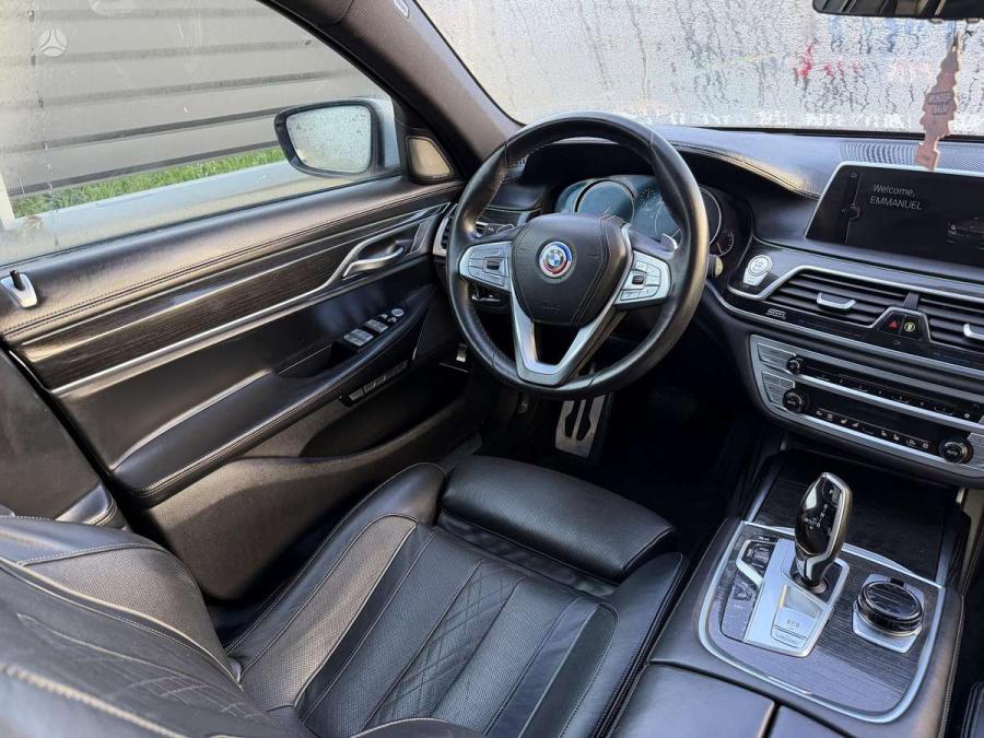 White BMW 750 2016 in Vilnius, with an engine capacity of 4.40 L and mileage of 148 thousand km for 15999 €, photo 16 on AUTOMOTO.COM.LV
