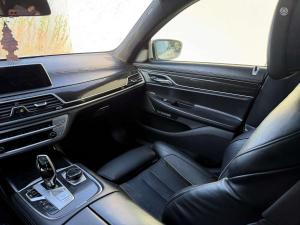 White BMW 750 2016 in Vilnius, with an engine capacity of 4.40 L and mileage of 148 thousand km for 15999 €, photo 18 on AUTOMOTO.COM.LV