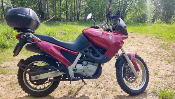Red BMW F 650 1996 in Vilnius, with an engine capacity of 0.65 L and mileage of 50 thousand km for 1500 €, photo 3 on AUTOMOTO.COM.LV