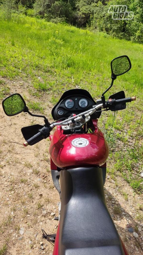 Red BMW F 650 1996 in Vilnius, with an engine capacity of 0.65 L and mileage of 50 thousand km for 1500 €, photo 4 on AUTOMOTO.COM.LV