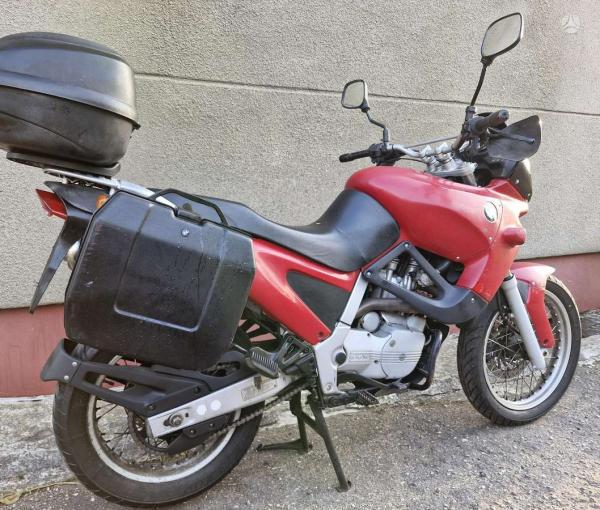 Red BMW F 650 1996 in Kaunas, with an engine capacity of 0.65 L and mileage of 27 thousand km for 1450 €, photo 4 on AUTOMOTO.COM.LV