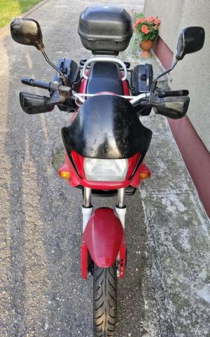 Red BMW F 650 1996 in Kaunas, with an engine capacity of 0.65 L and mileage of 27 thousand km for 1450 €, photo 13 on AUTOMOTO.COM.LV