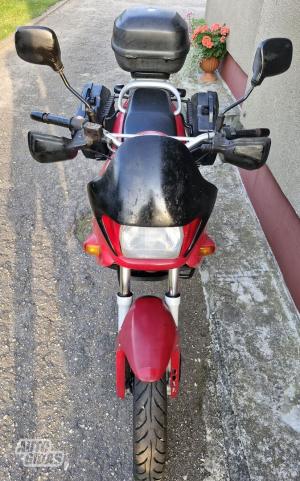 Red BMW F 650 1996 in Kaunas, with an engine capacity of 0.65 L and mileage of 15 thousand km for 1550 €, photo 6 on AUTOMOTO.COM.LV