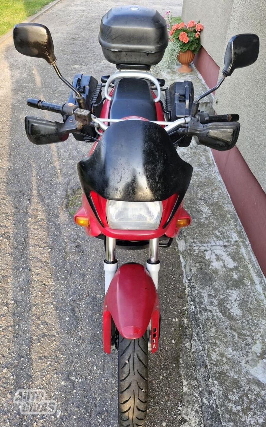 Red BMW F 650 1996 in Kaunas, with an engine capacity of 0.65 L and mileage of 15 thousand km for 1550 €, photo 6 on AUTOMOTO.COM.LV
