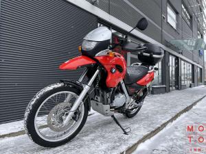 Red BMW F 650GS 2000 in Riga, with an engine capacity of 0.65 L and mileage of 69 thousand km for 2499 €, photo  on AUTOMOTO.COM.LV