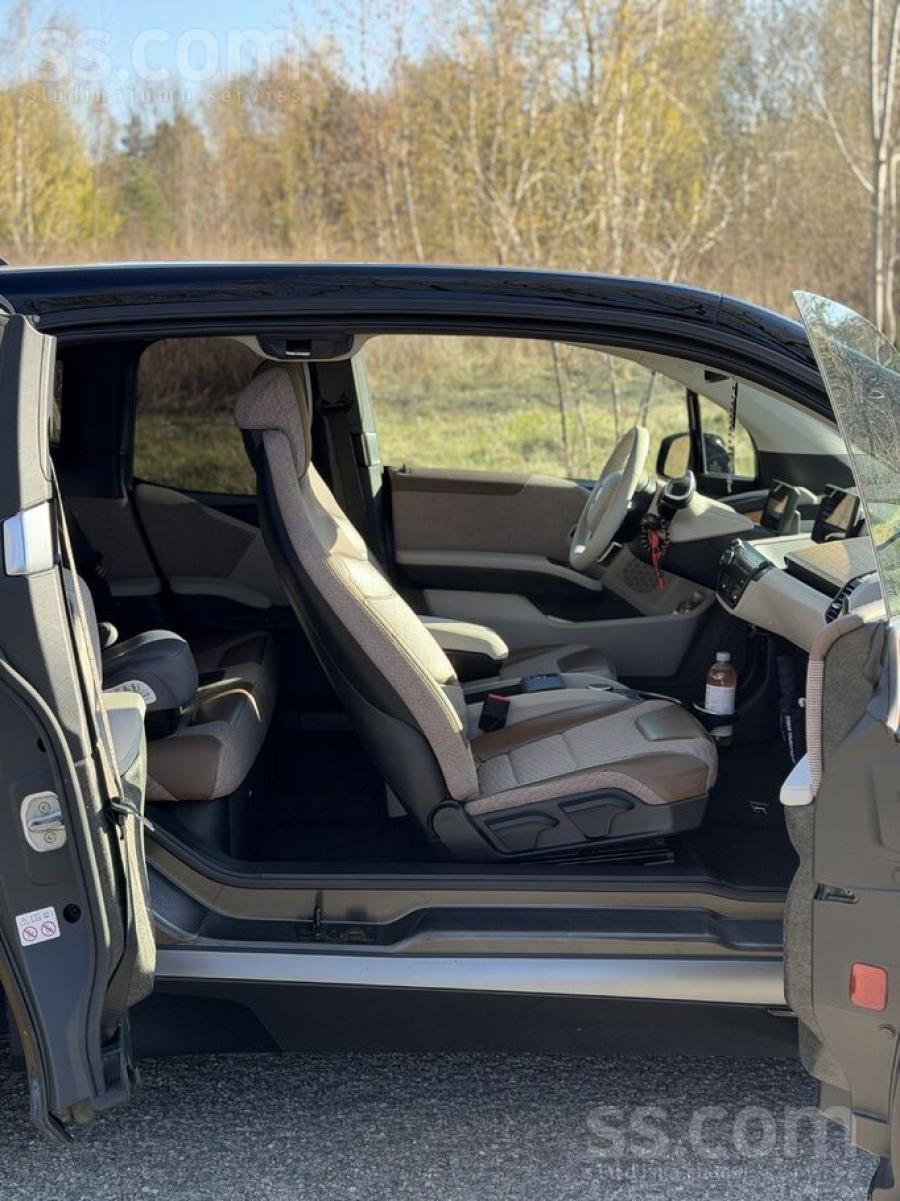 Black BMW I3 2021 in Riga, with an engine capacity of 0.00 L and mileage of 100 thousand km for 16000 €, photo 11 on AUTOMOTO.COM.LV