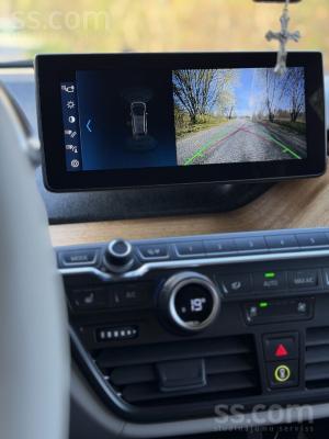 Black BMW I3 2021 in Riga, with an engine capacity of 0.00 L and mileage of 100 thousand km for 15999 €, photo 14 on AUTOMOTO.COM.LV